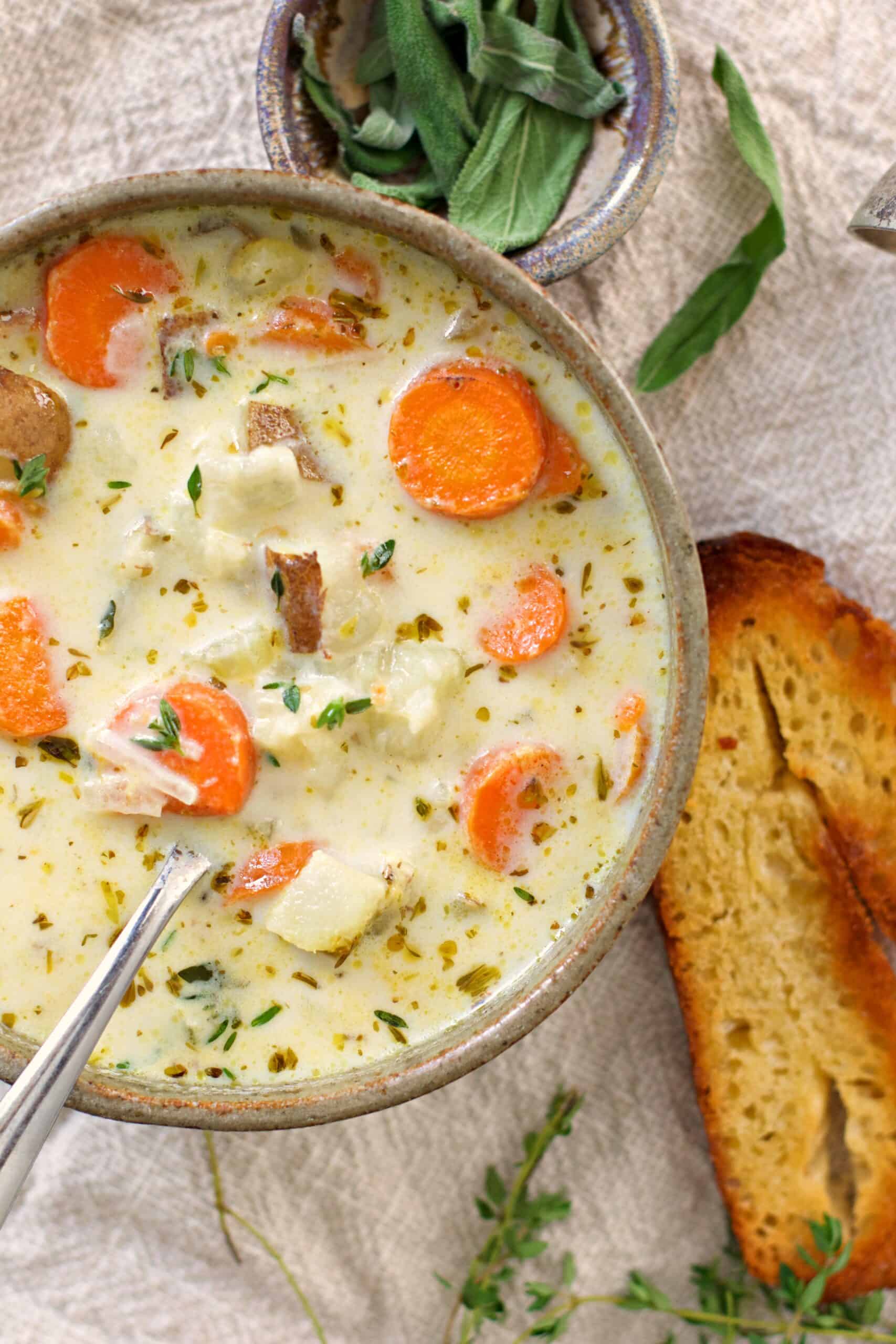 Creamy Potato Soup- veggies, garlic, and fresh herbs -elkeliving.com