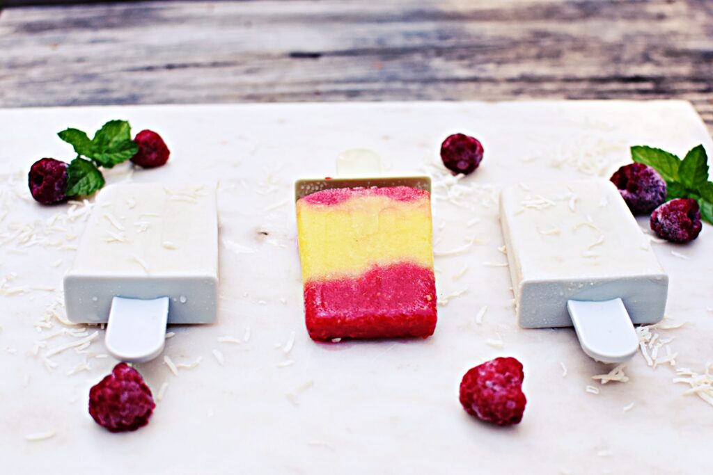 Healthy Popsicles 2 Ways- Coconut & Raspberry Pineapple- elkeliving.com